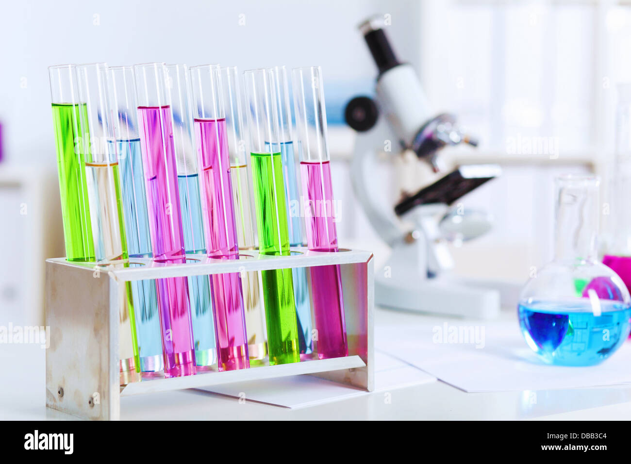 Chemistry laboratory glassware with colour liquids Stock Photo - Alamy
