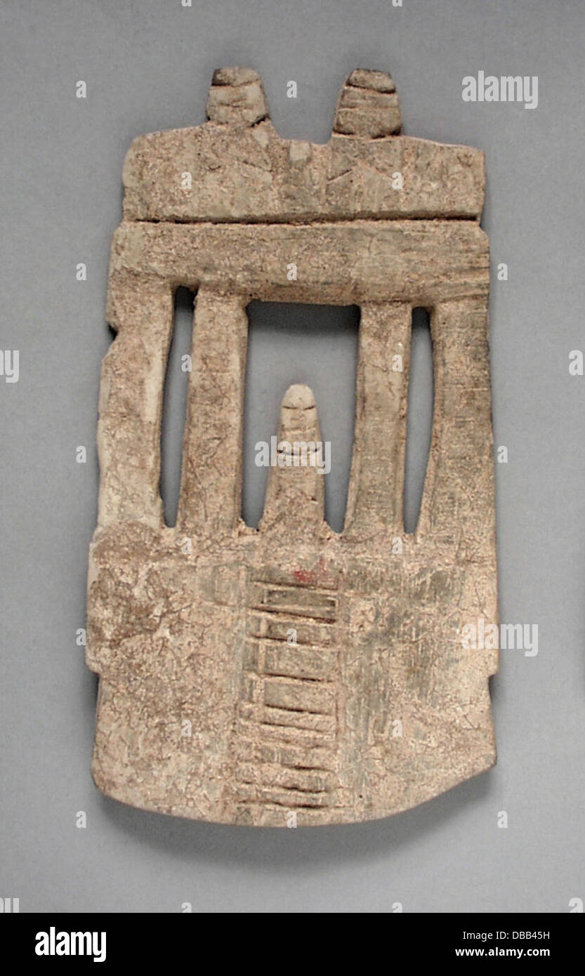 A small-scale temple model made of bronze, showcasing the architectural ...