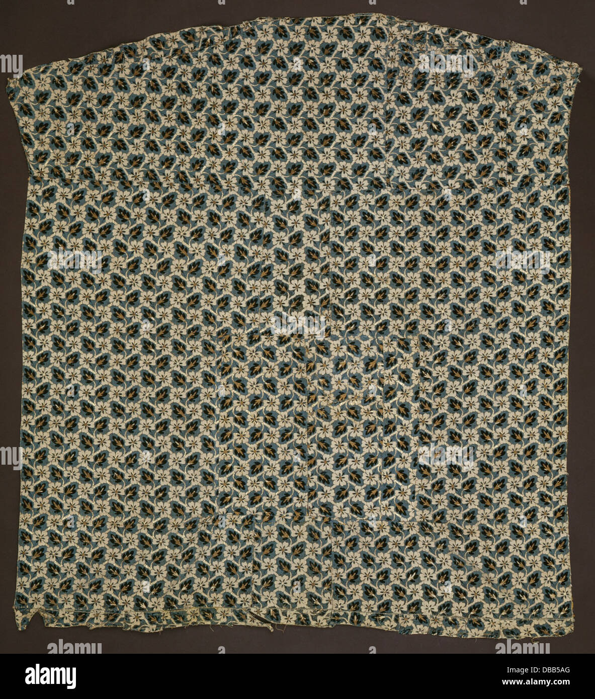 This textile, featuring an interlacing floral design, is part of the ...