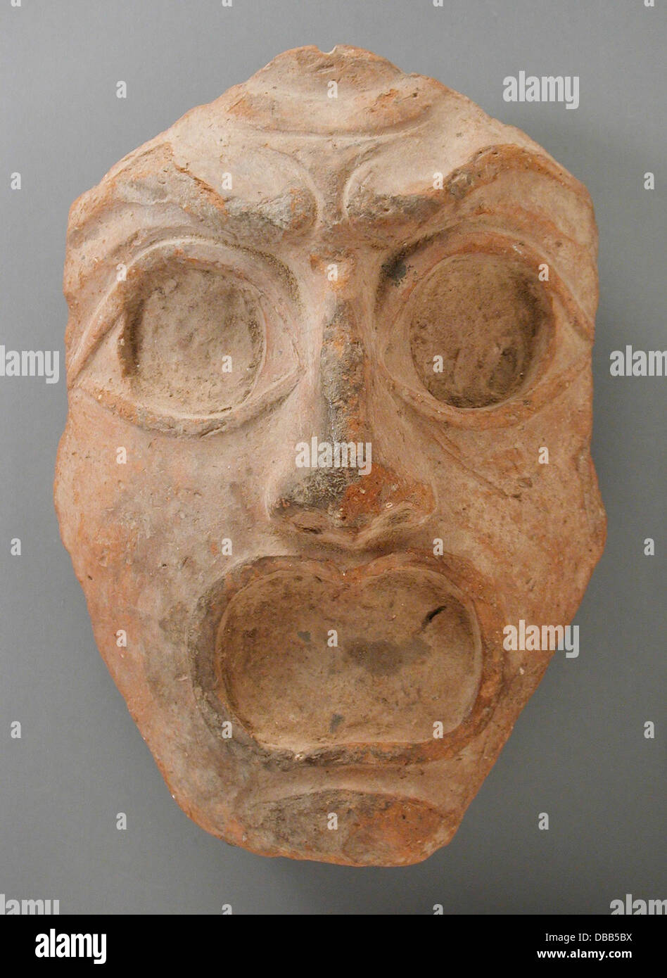 This theater mask represents a traditional cultural symbol used in ...