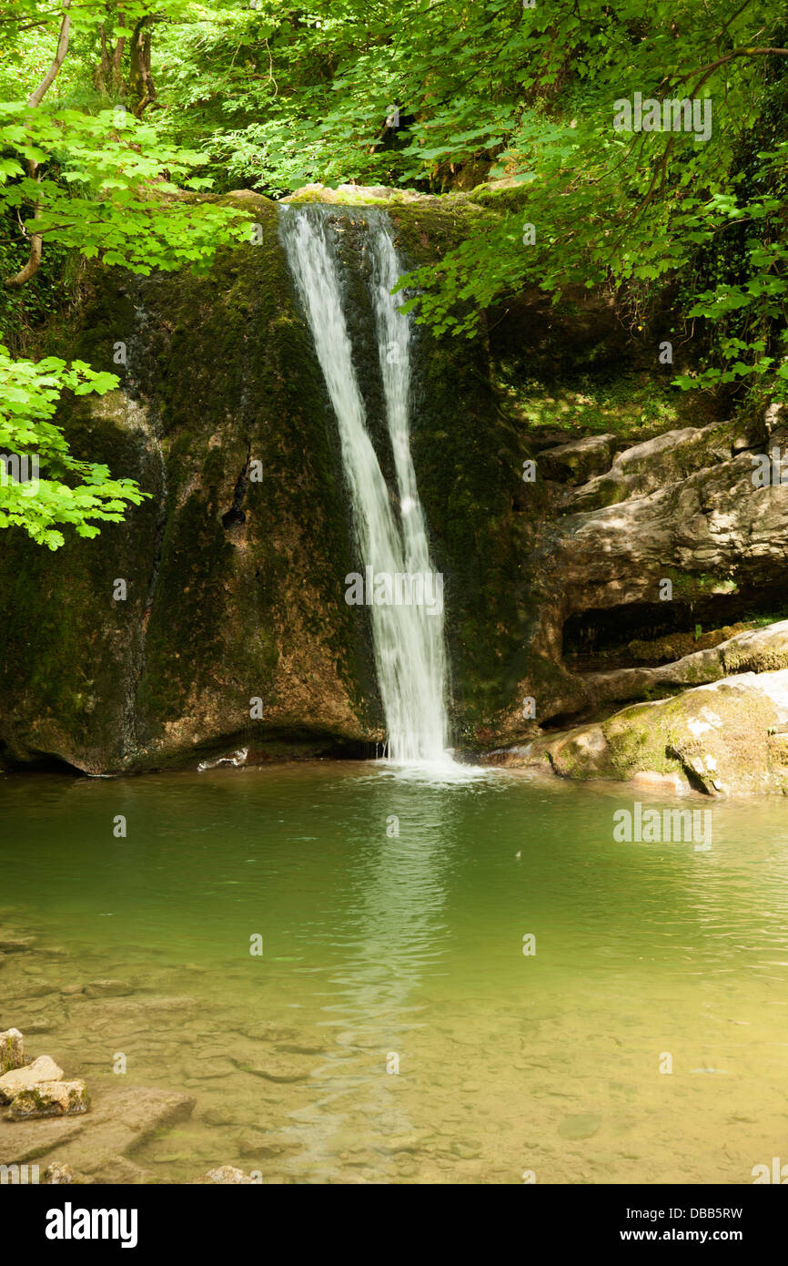 Janet's foss waterfall spilling into a still pool Stock Photo - Alamy