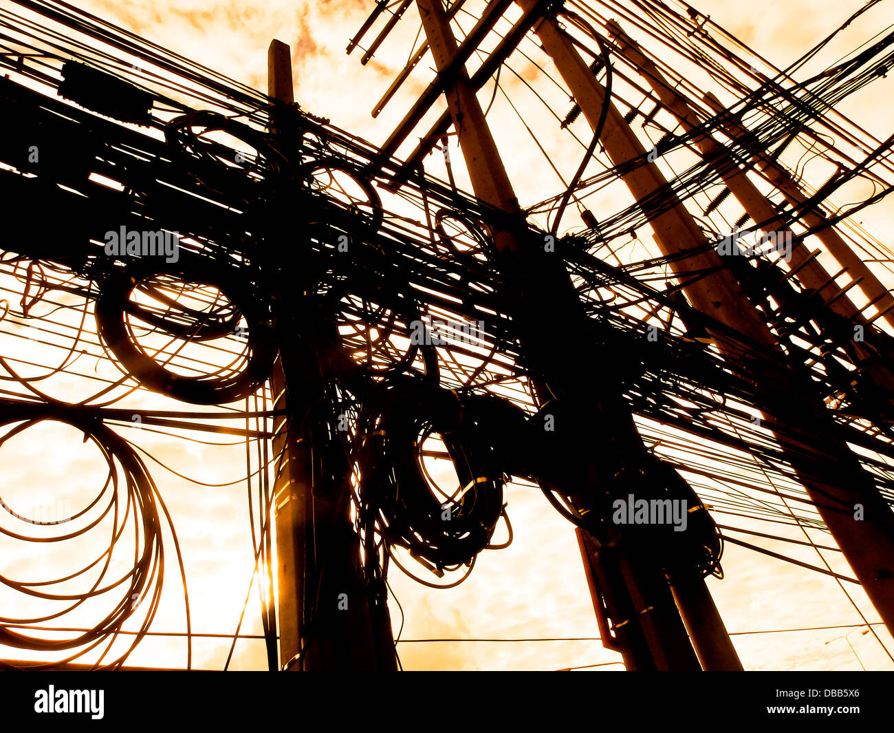 Tangled power lines Stock Photo - Alamy