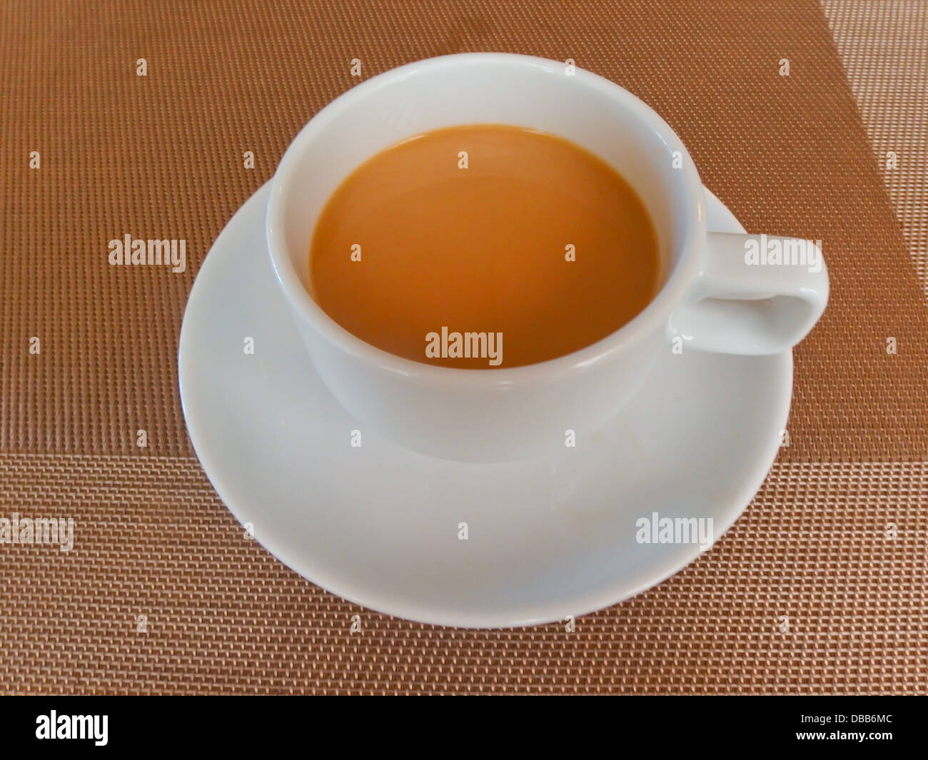 cup of coffee on Pad plate Stock Photo - Alamy
