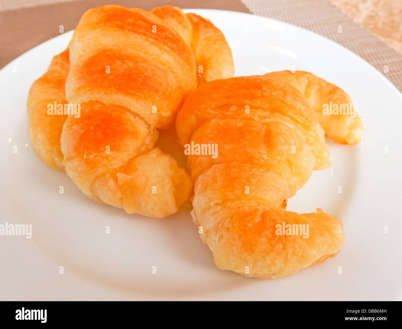 Croissants on white dish Stock Photo - Alamy