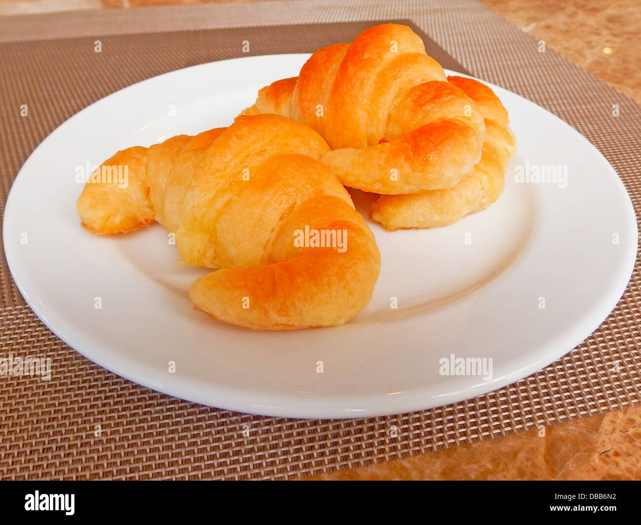 Croissants on white dish Stock Photo - Alamy