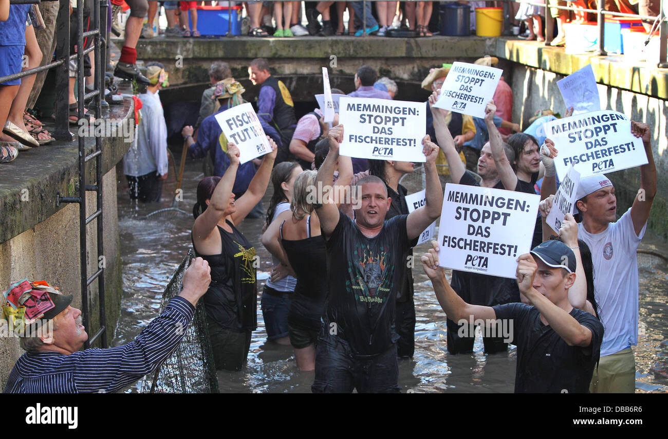 Peta activists protest the traditional fishing day in Memmingen ...