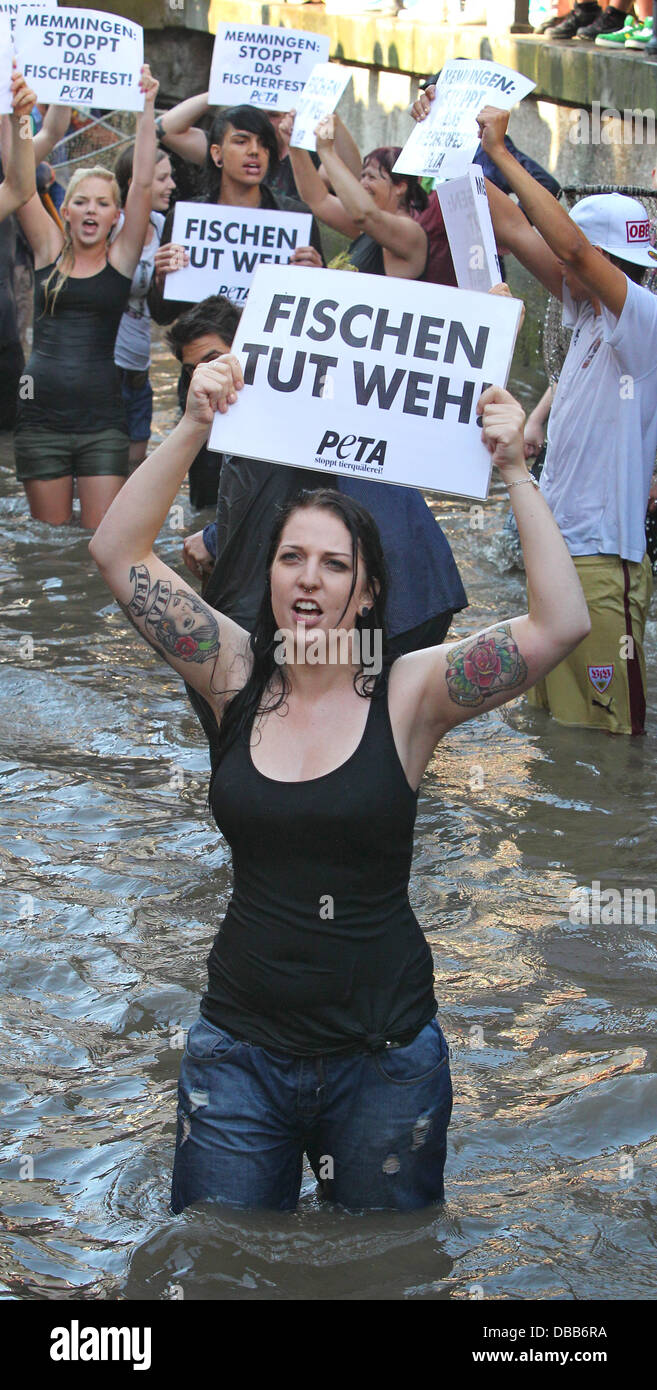 Peta activists protest the traditional fishing day in Memmingen ...