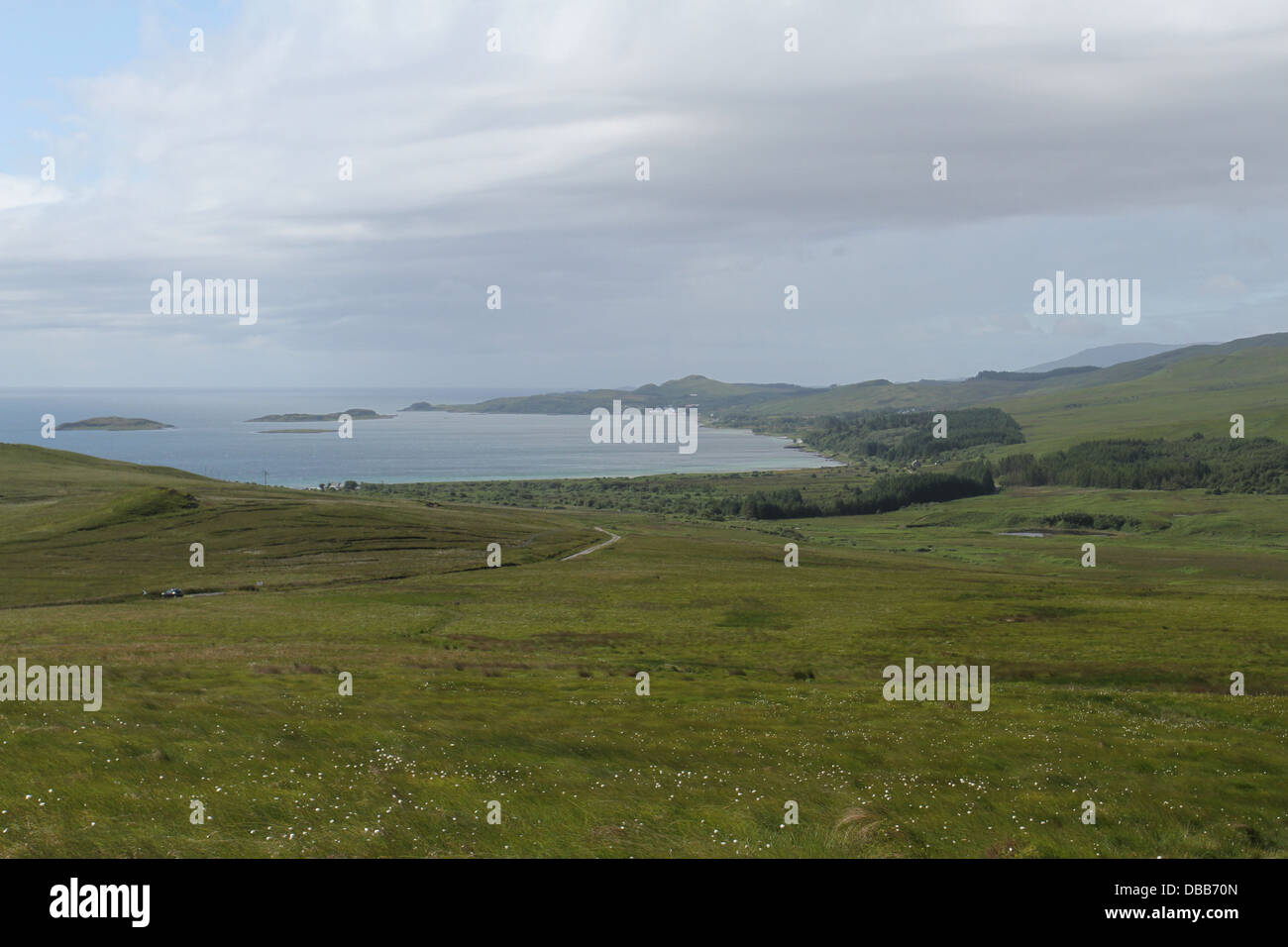 Distant view of Craighouse and east coast of Isle of Jura Scotland July ...