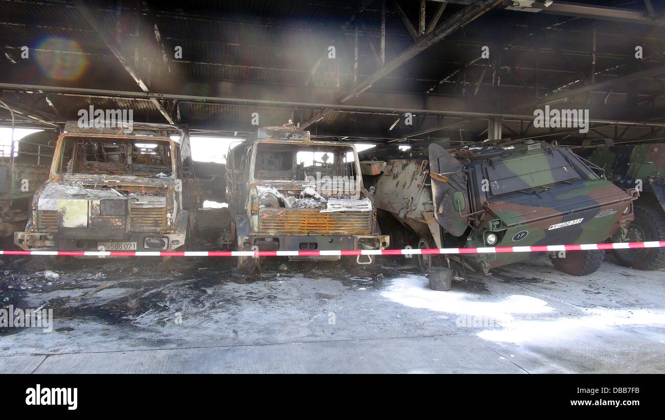 German Army burned out trucks and specialty vehichles are parked at the ...