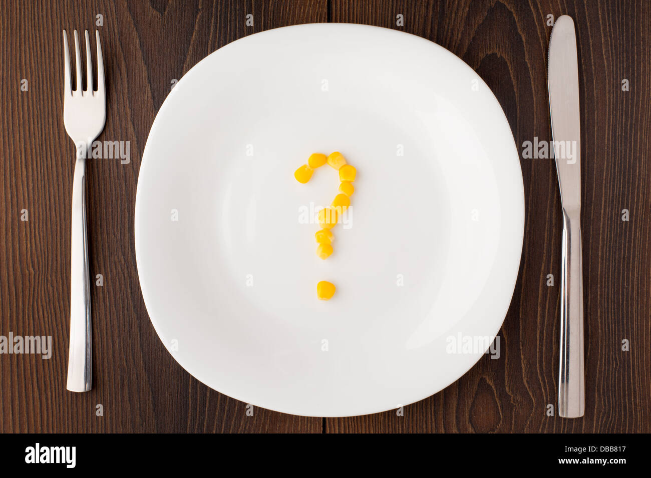Question mark made of corn seeds on plate Stock Photo - Alamy