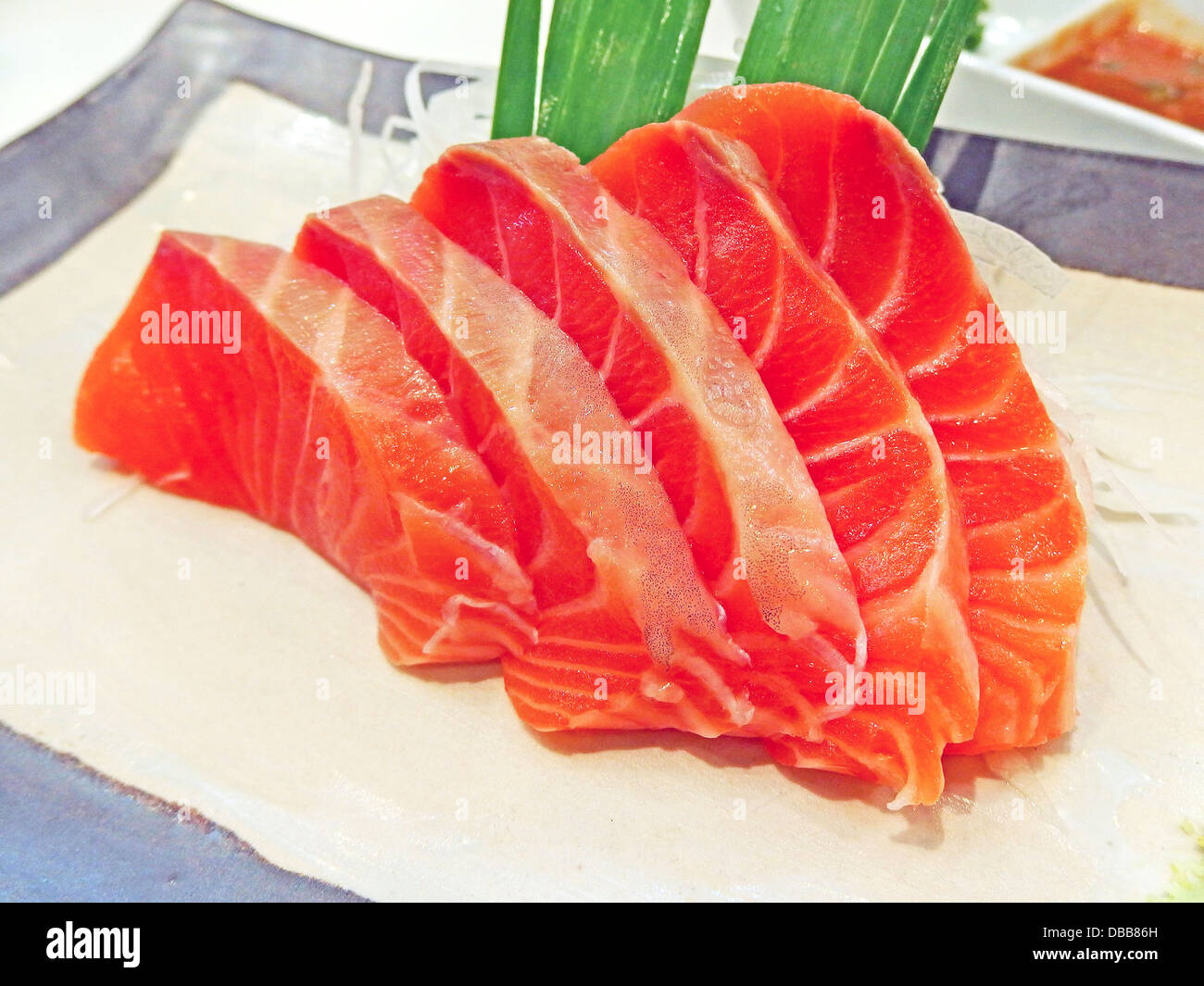 Sliced raw fatty salmon (Salmon sashimi Stock Photo - Alamy