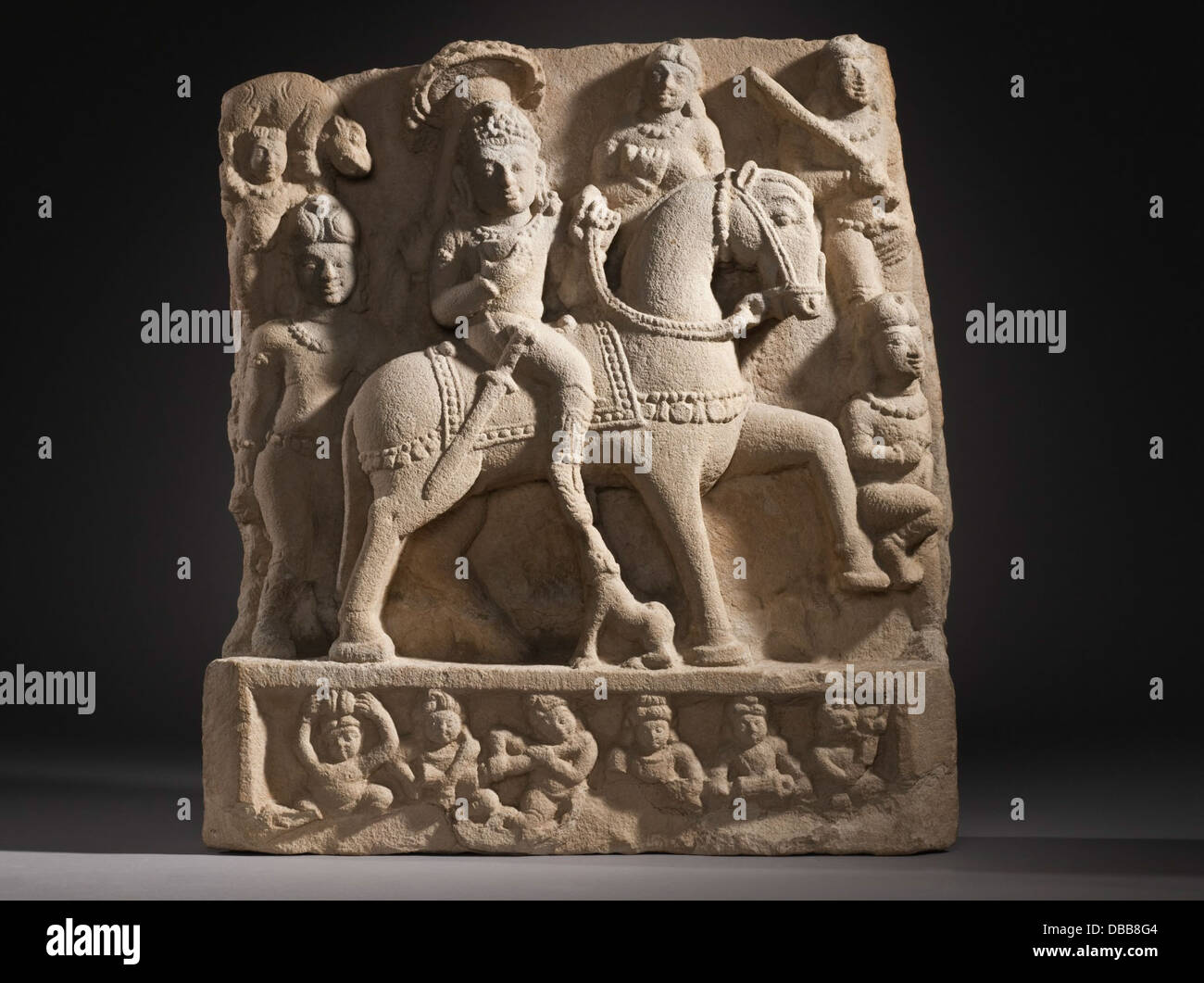 This sculpture depicts the Hindu god Revanta with his companions ...