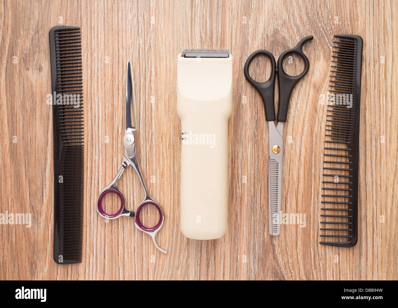 Barber accessories on wooden table Stock Photo - Alamy