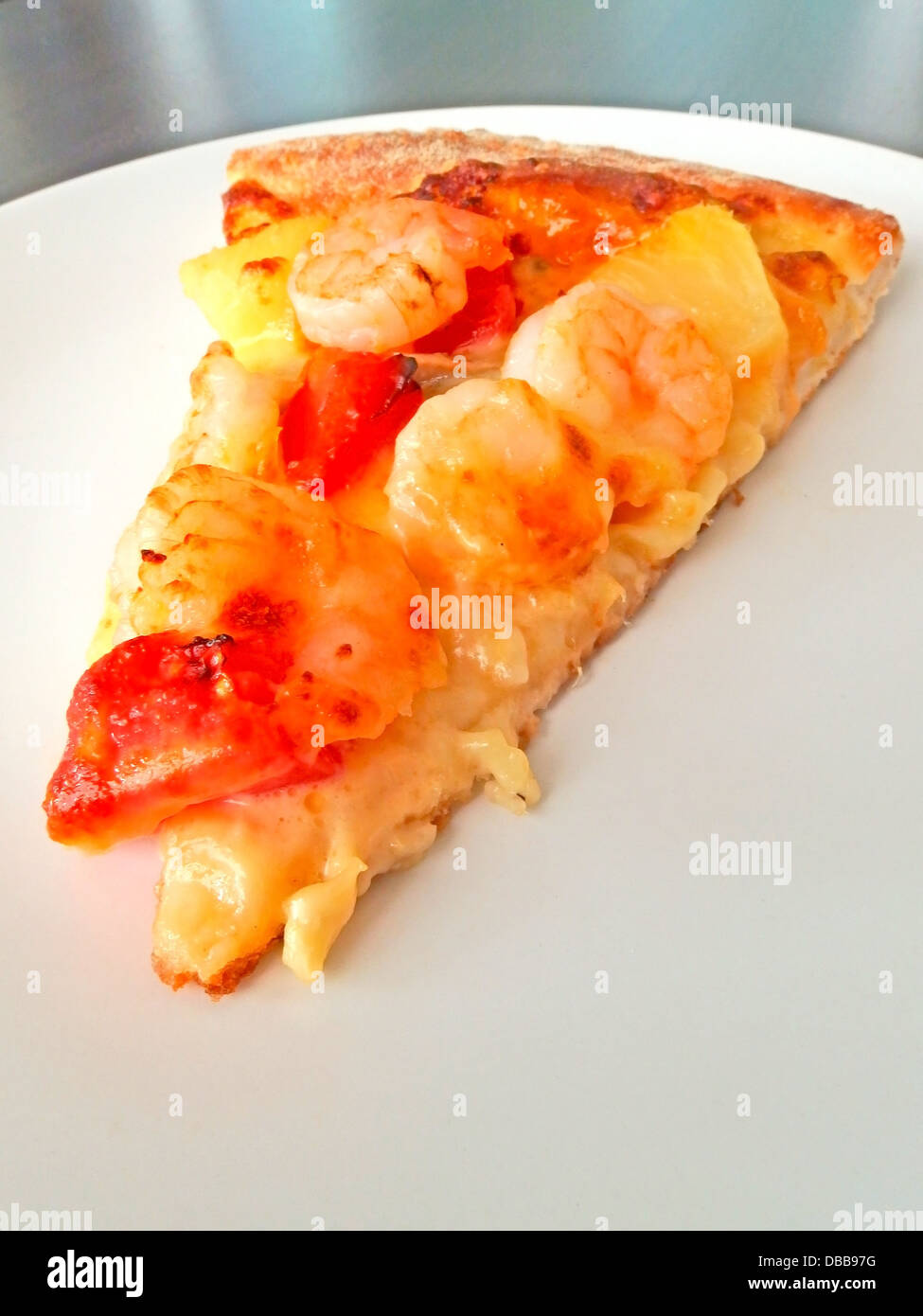 Cut off slice pizza on white dish Stock Photo - Alamy