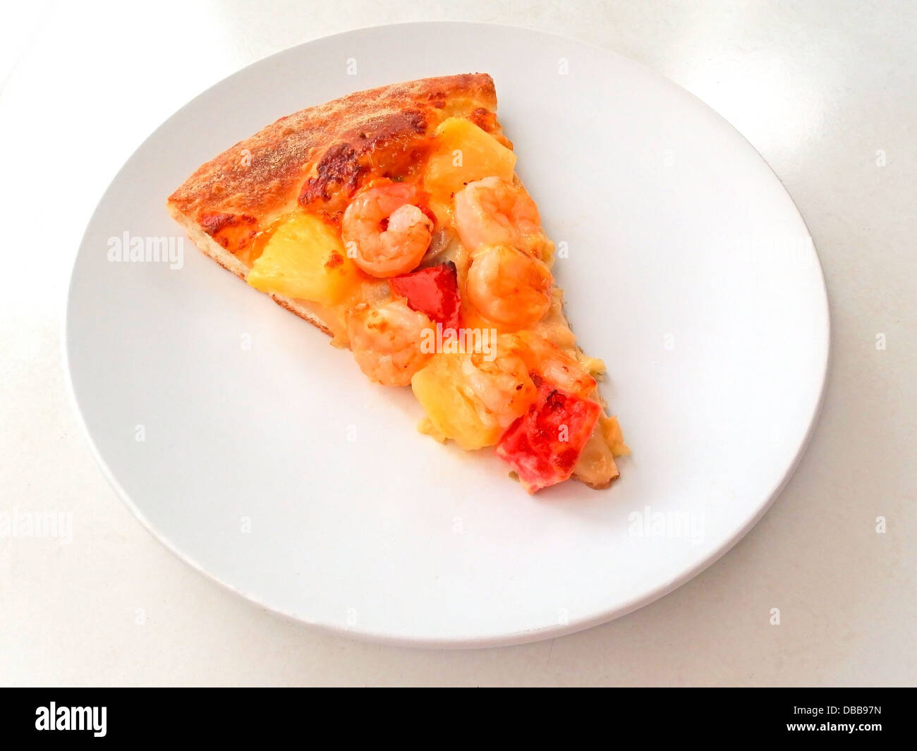 Cut off slice pizza on white dish Stock Photo - Alamy