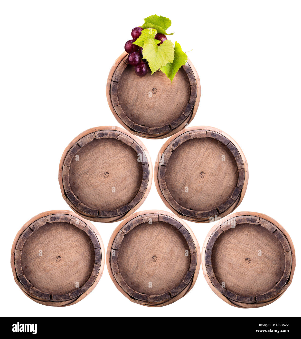 Wine barrels with grapevine in pyramid isolated Stock Photo - Alamy