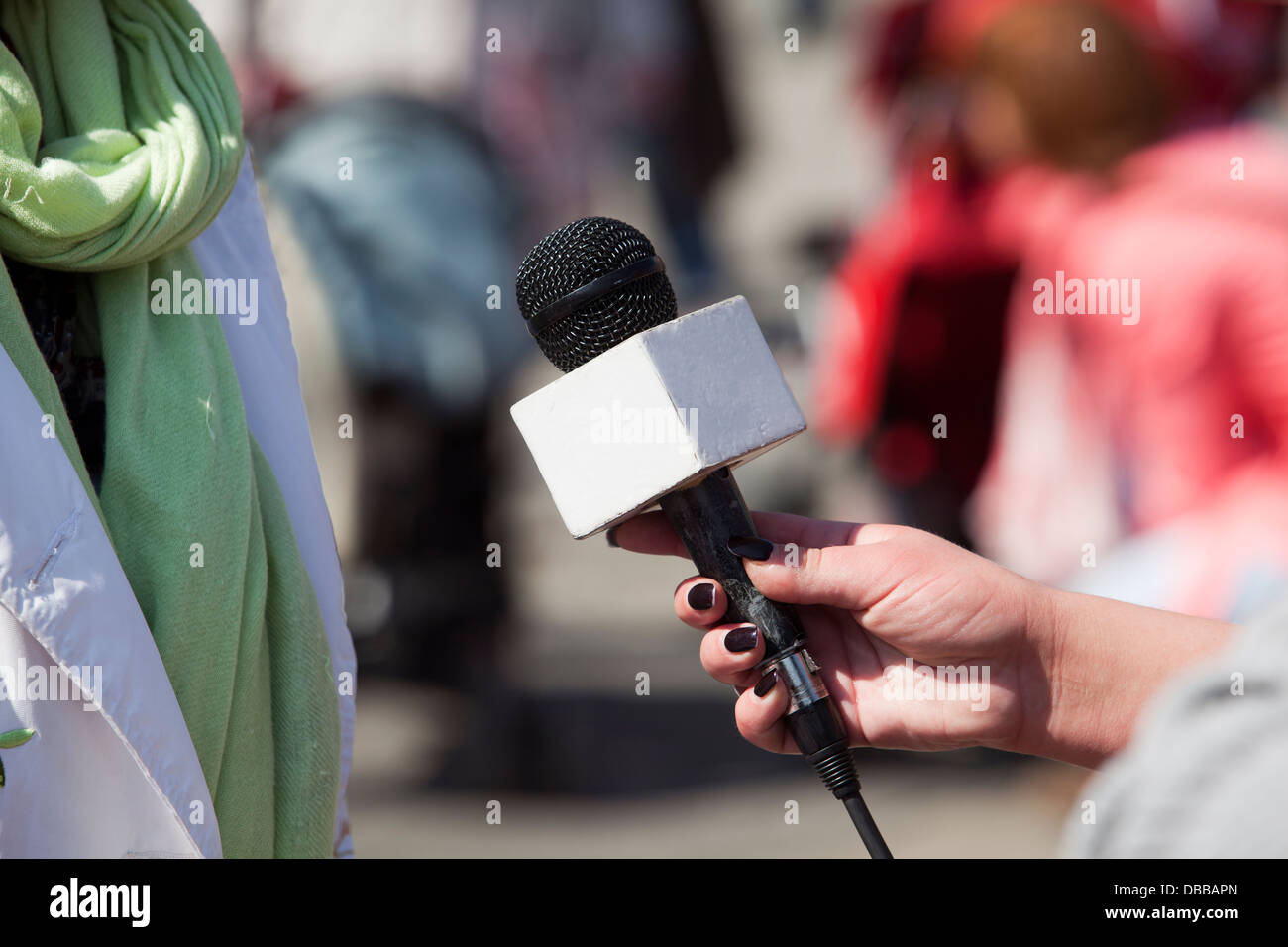 interview with a microphone Stock Photo - Alamy