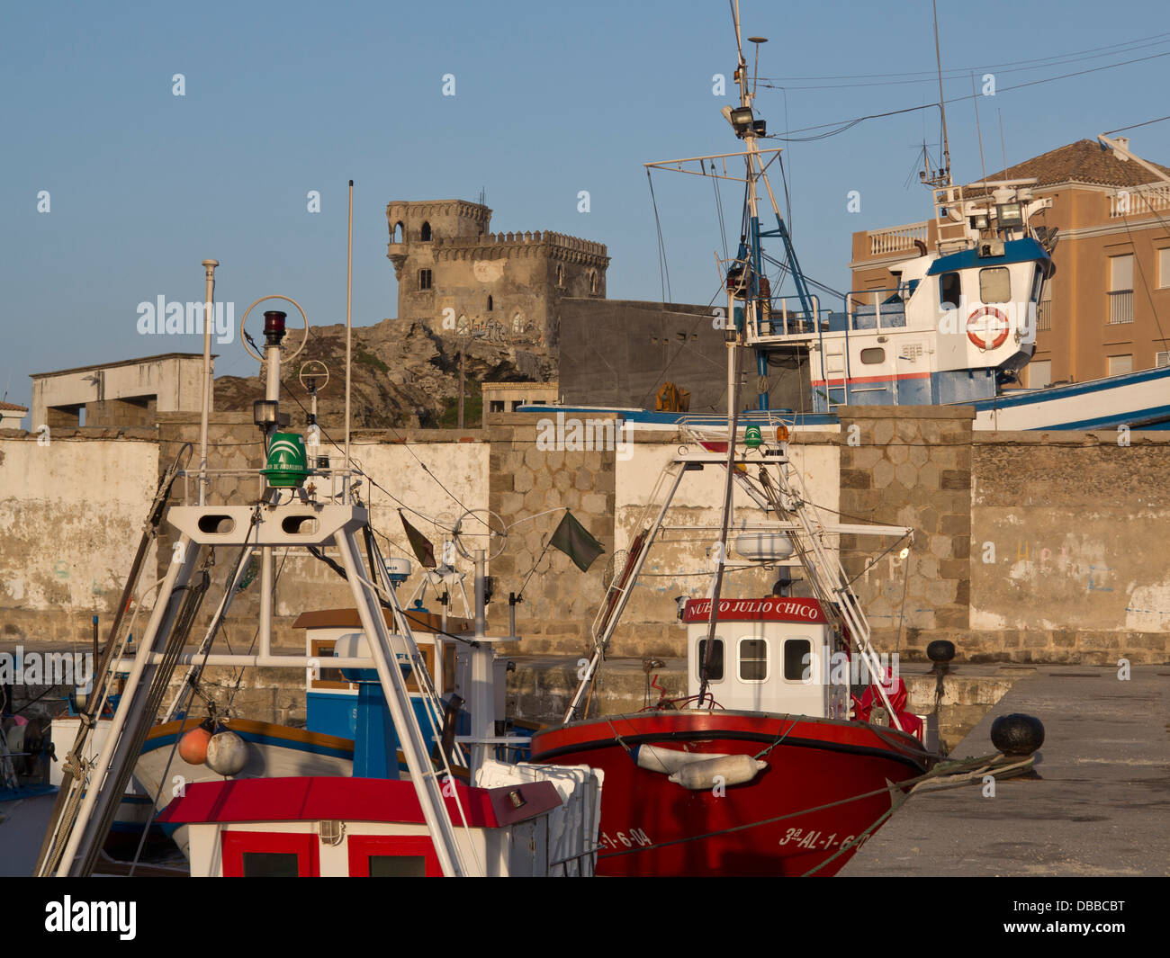 Fishing boats at the harbour in the port of Tarifa, Andalucia, Spain ...