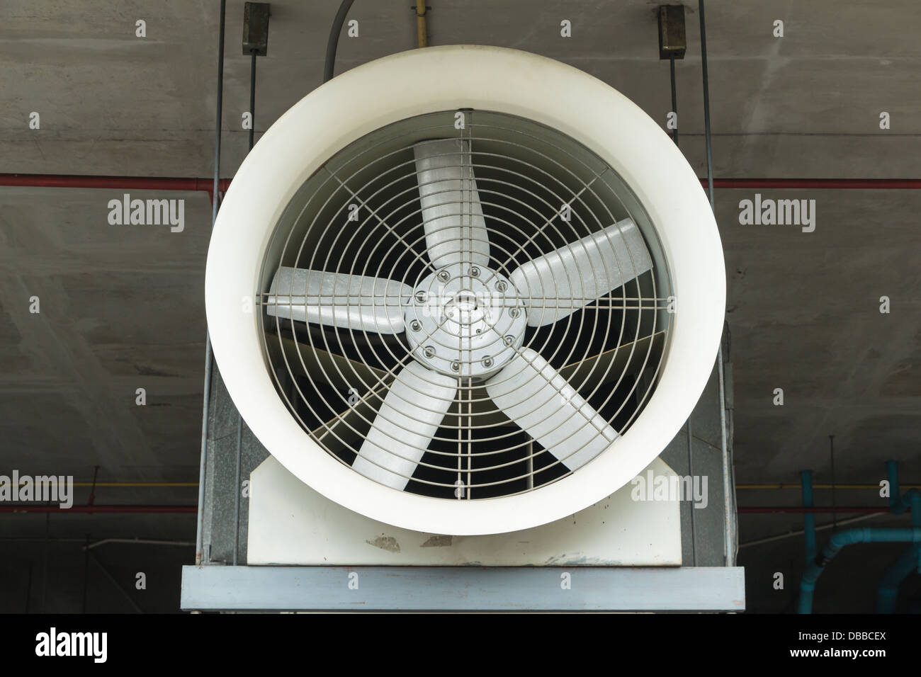 Industrial fan behind a metal grate Stock Photo - Alamy