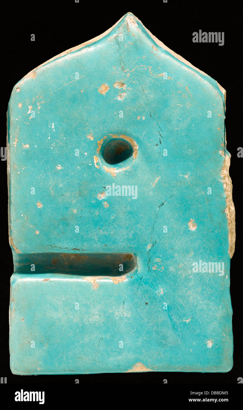 A tile in the shape of the letter 'Waw,' part of the ancient Near East ...