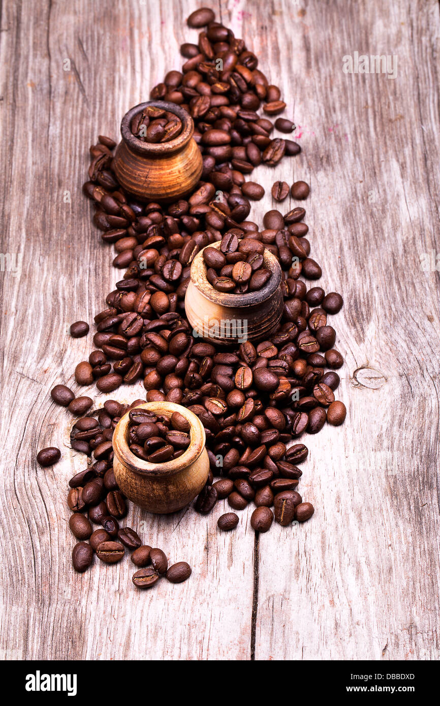 Closeup of coffee beans. Coffee bean on macro ground coffee background ...