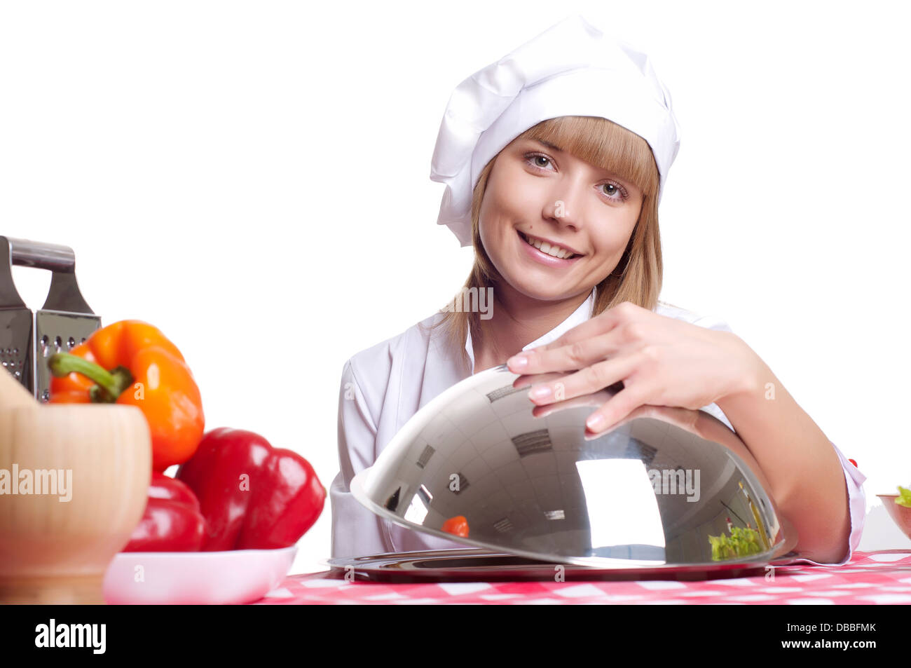 Attractive cook woman a over white background Stock Photo - Alamy