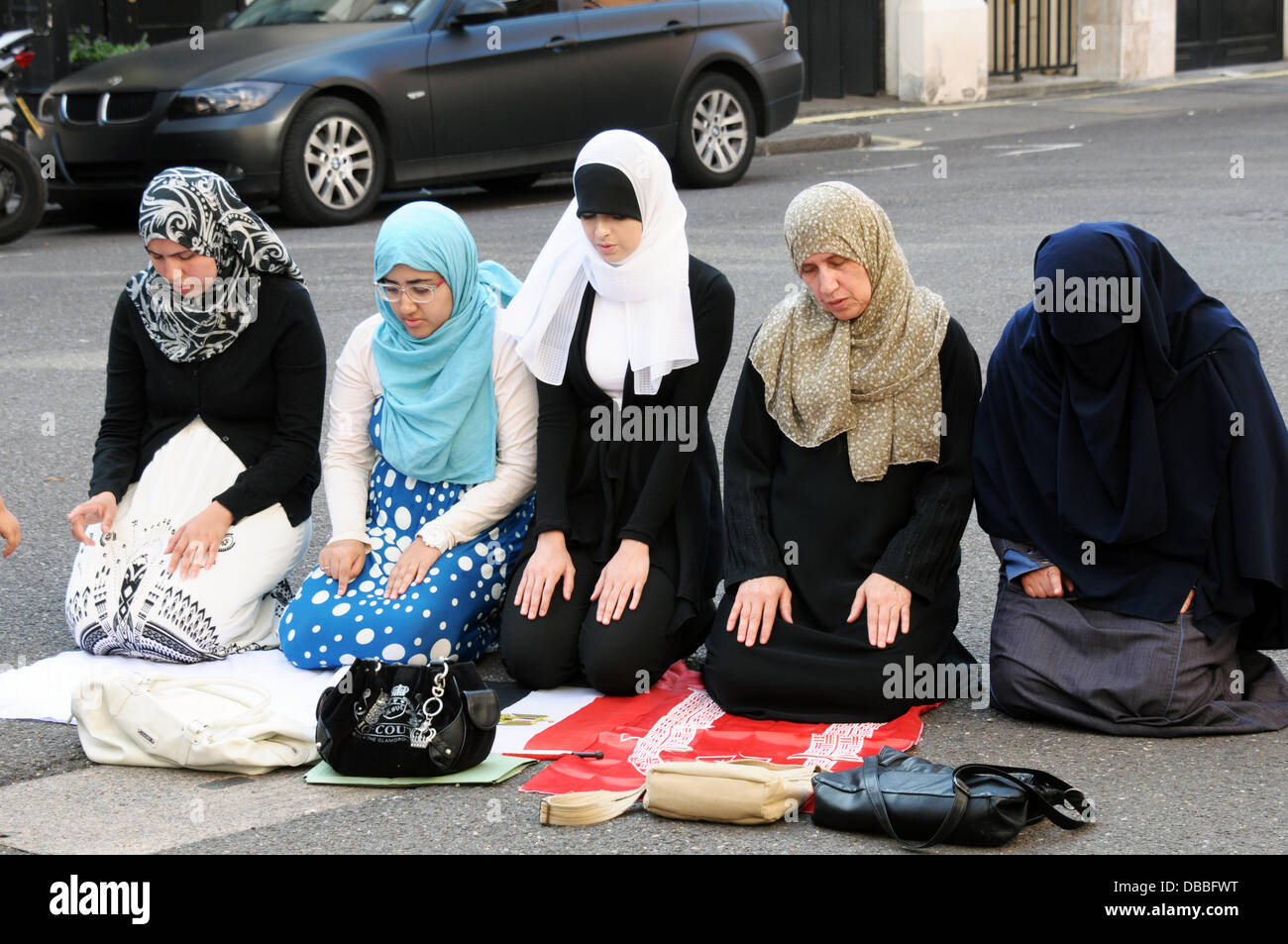 London, UK. 26th July, 2013. A Anti-Coup protesters praying outside the ...