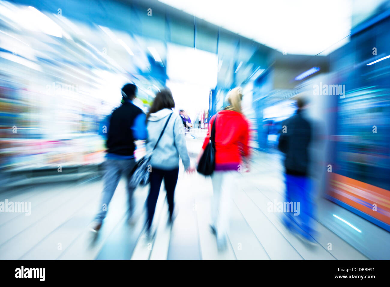 A shopper walking past a store window Stock Photo - Alamy