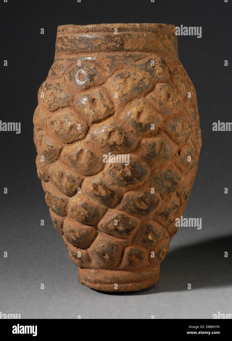 This intricately designed vase, made of bronze, showcases the refined ...