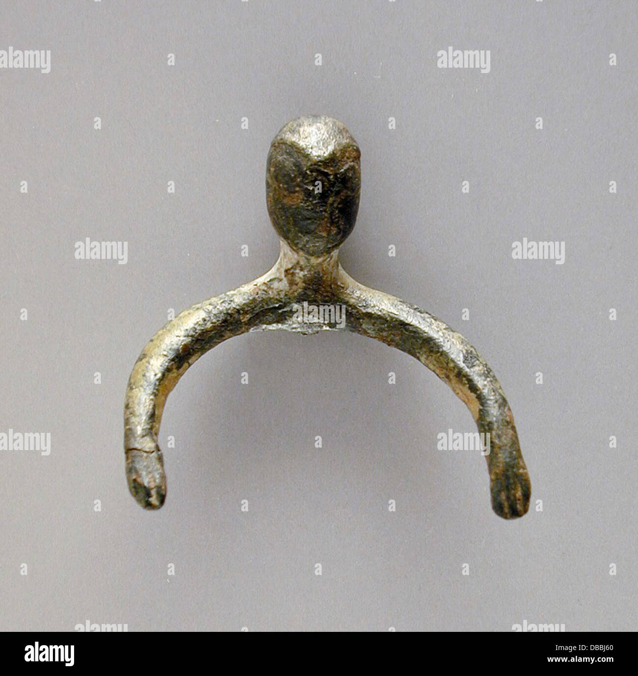 This vessel handle, part of a larger container, is an example of ...