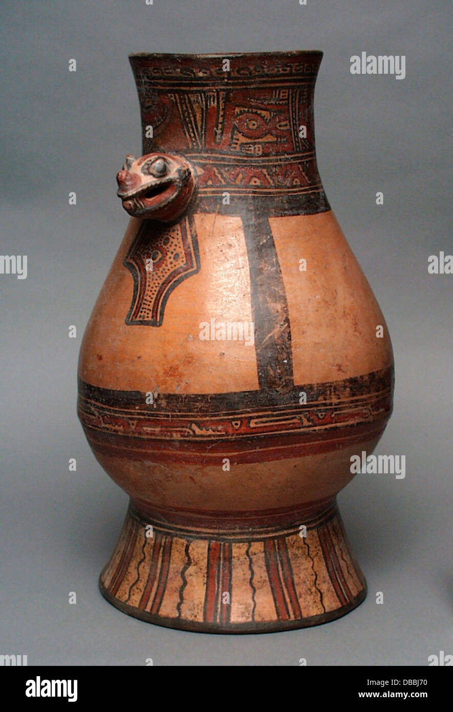 This vessel represents a form of ancient pottery, crafted with distinct ...