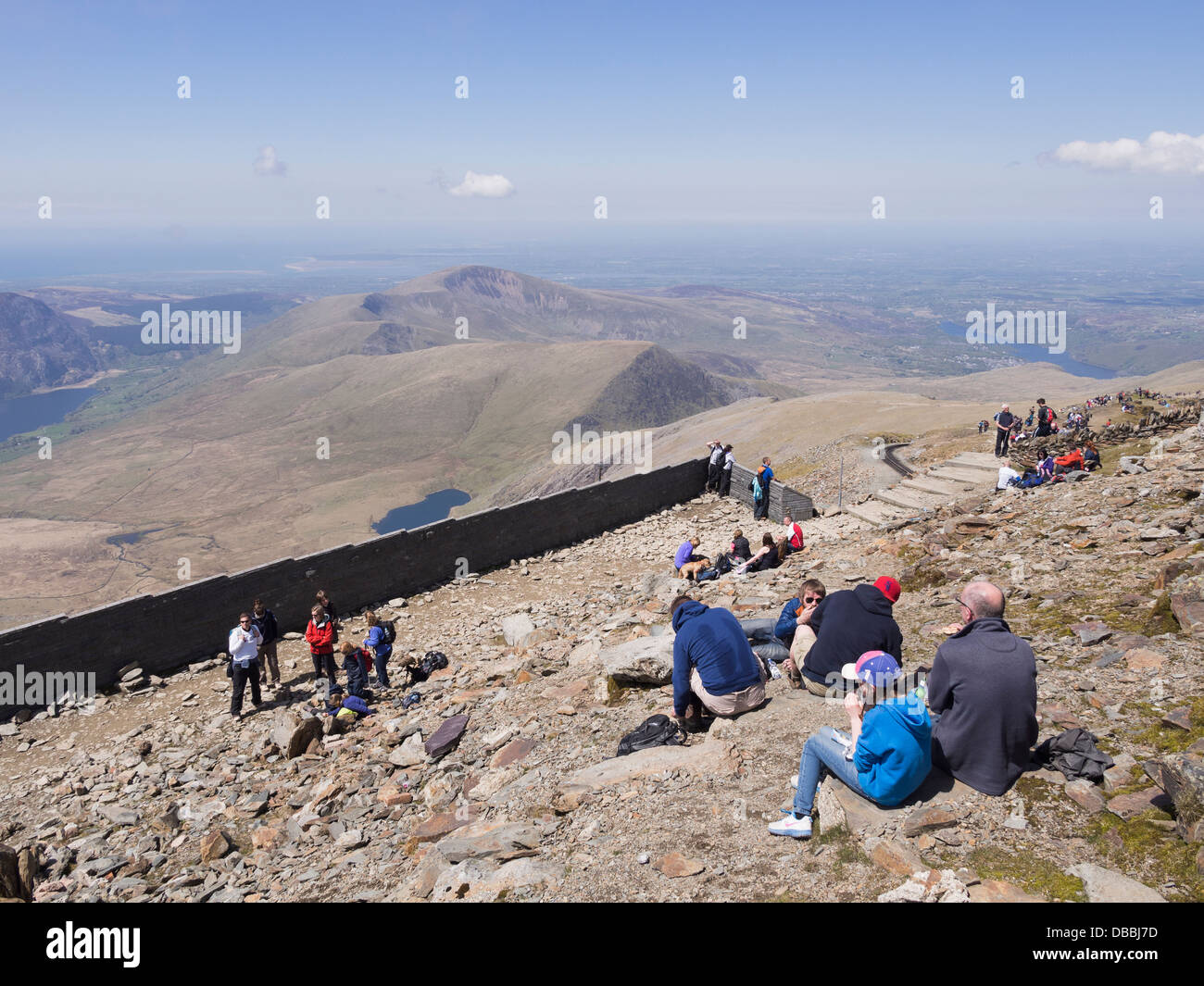 Scene with people resting on Mount Snowdon summit in Snowdonia National ...