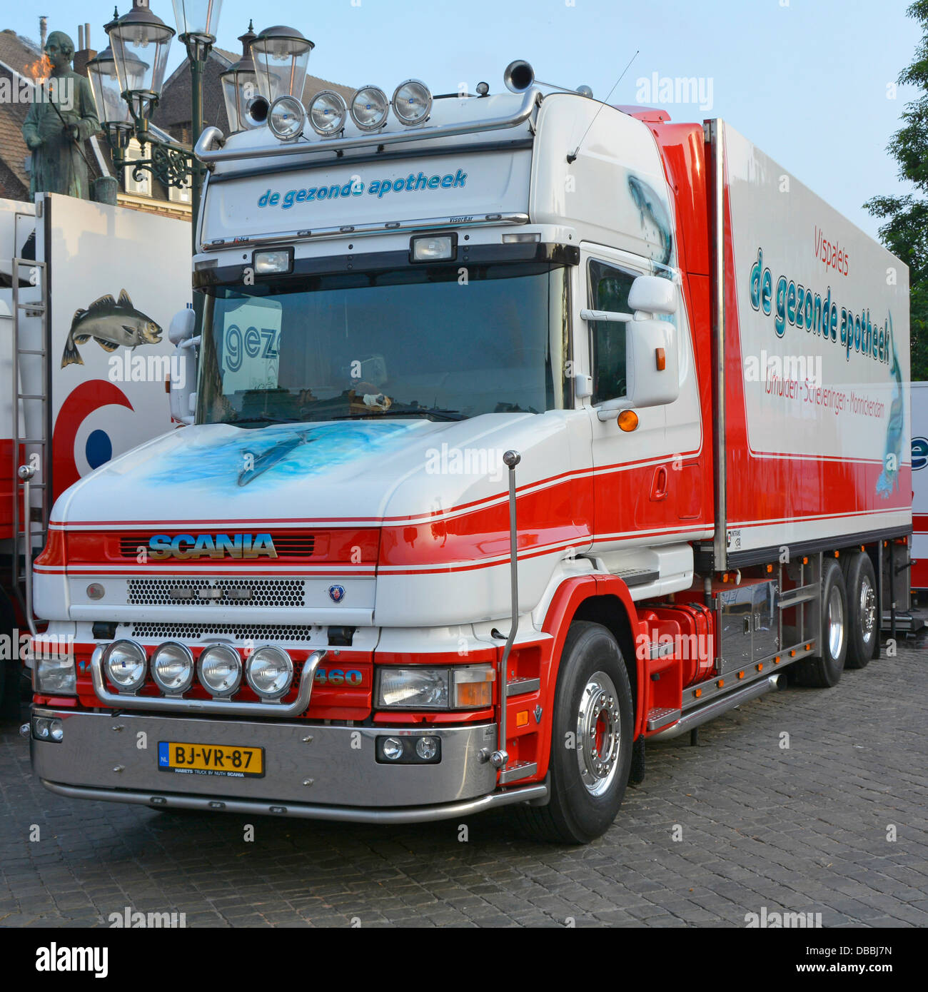 Maastricht close up front and side view red and white large Scania ...