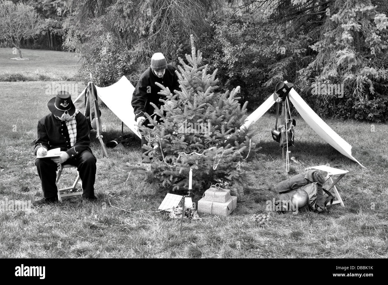 Young Civil War soldier reenactors at Christmas time decorating a ...