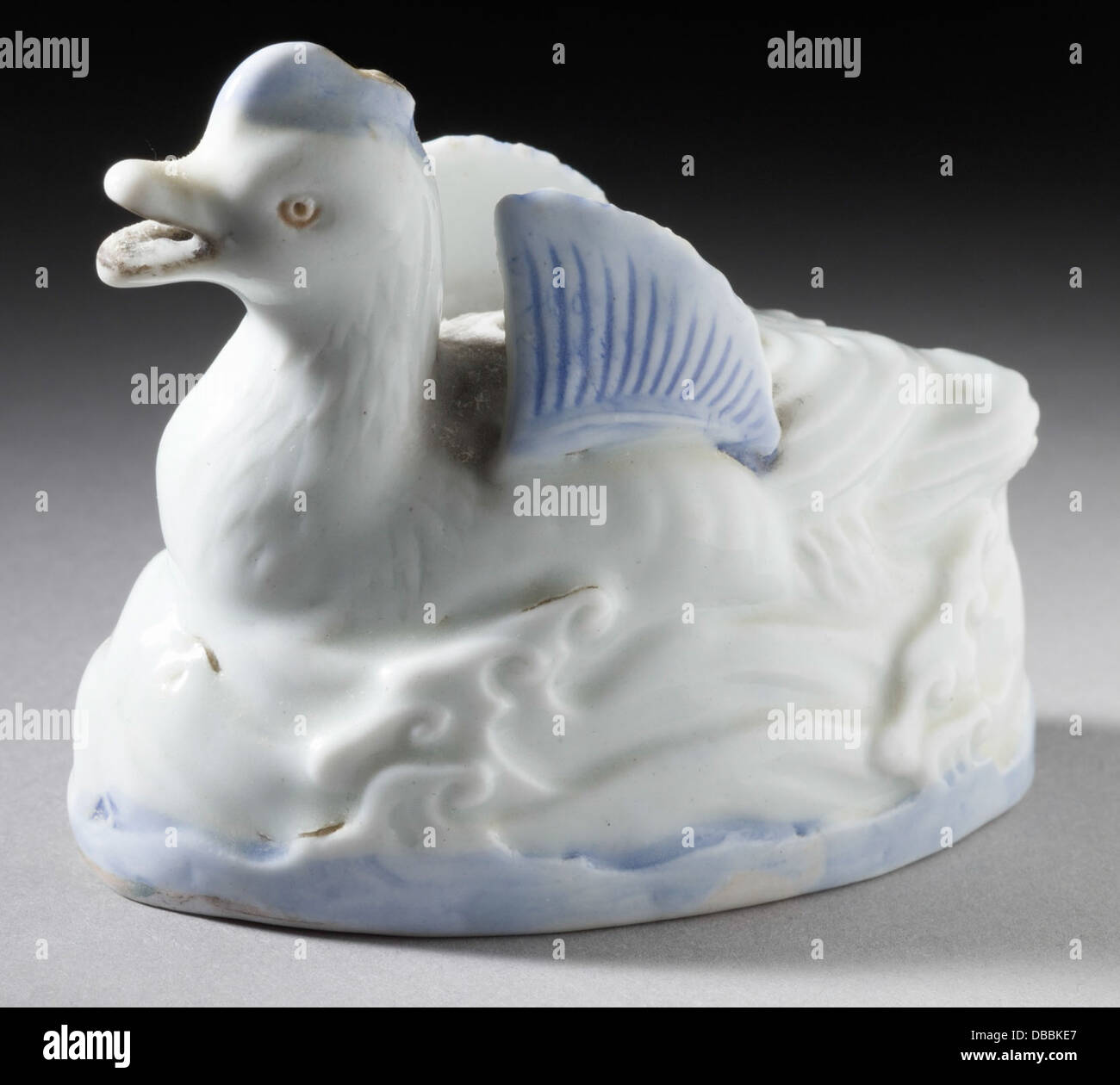 A water dropper crafted in the shape of a mandarin duck, combining ...