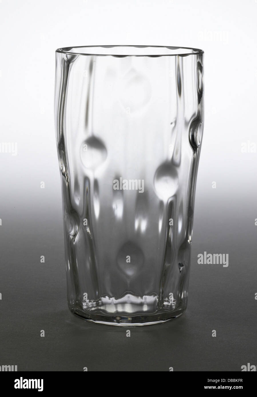 This clear water glass showcases fine craftsmanship and design, serving ...