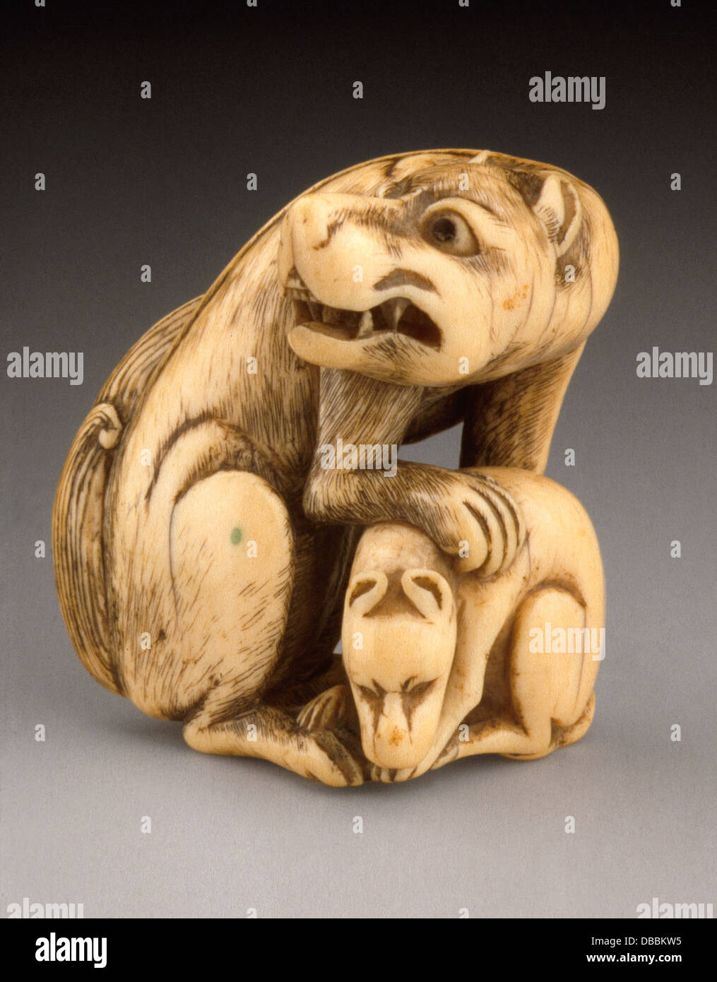 This sculpture of a wolf and its whelp captures the bond between the ...