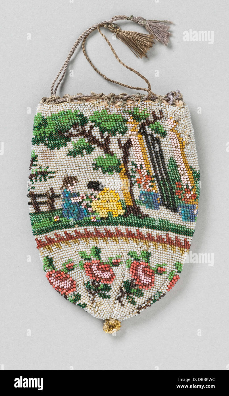 A delicate woman's bag, or reticule, crafted from luxurious materials ...