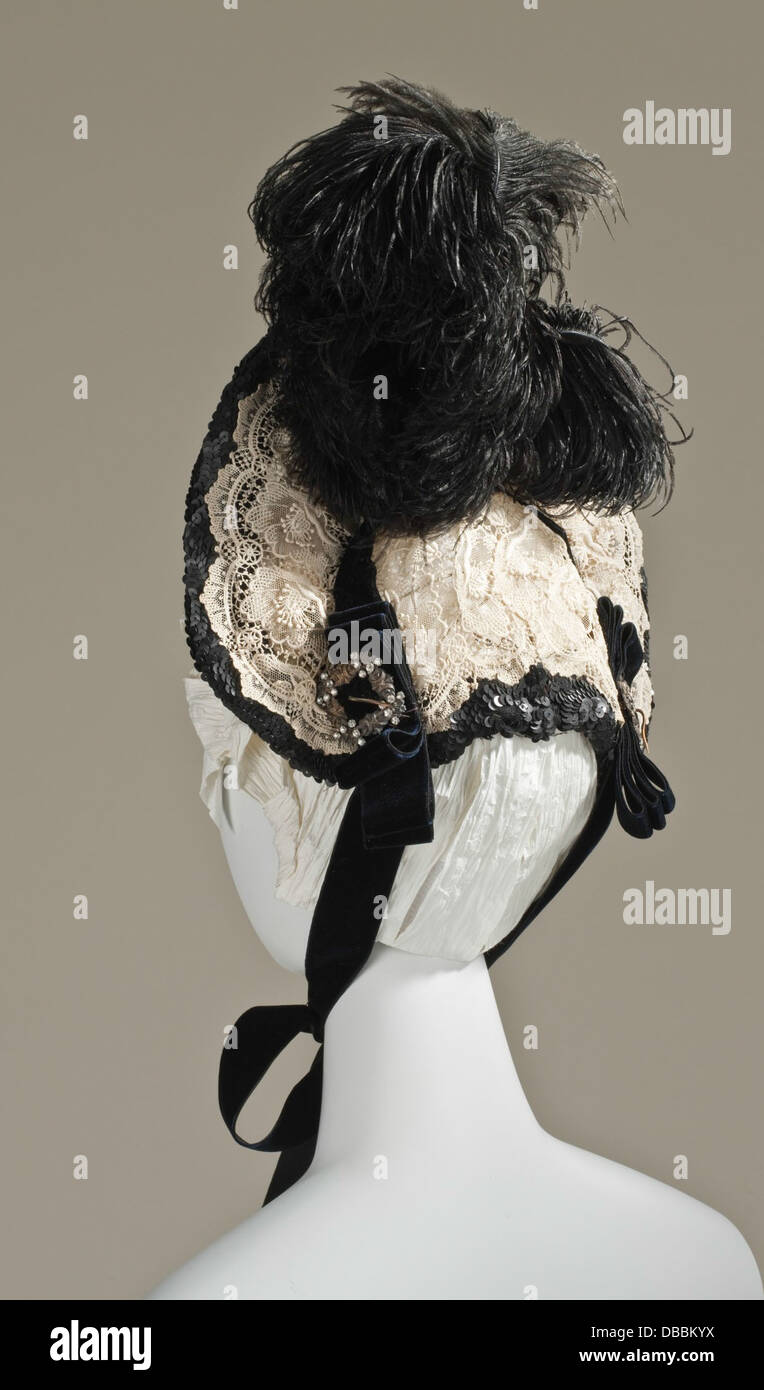 This woman's bonnet, crafted with intricate detail, reflects the ...