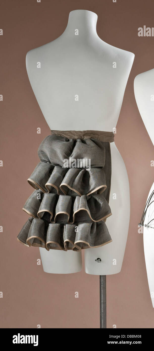 This 19th-century woman's bustle is a fashion accessory used to shape ...
