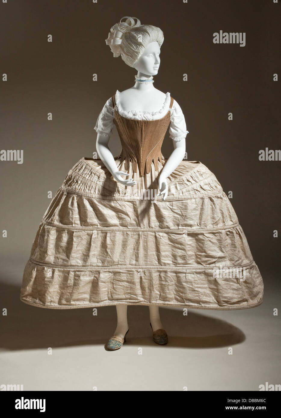 A bronze cast woman's corset, designed with intricate details ...