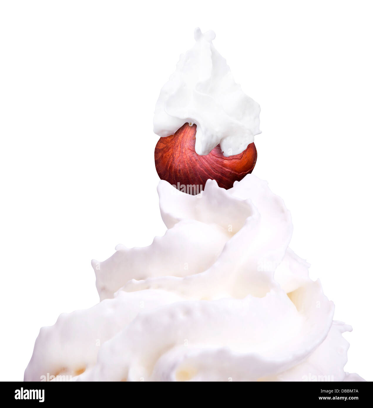 Whipped cream with tasty filbert isolated background Stock Photo - Alamy