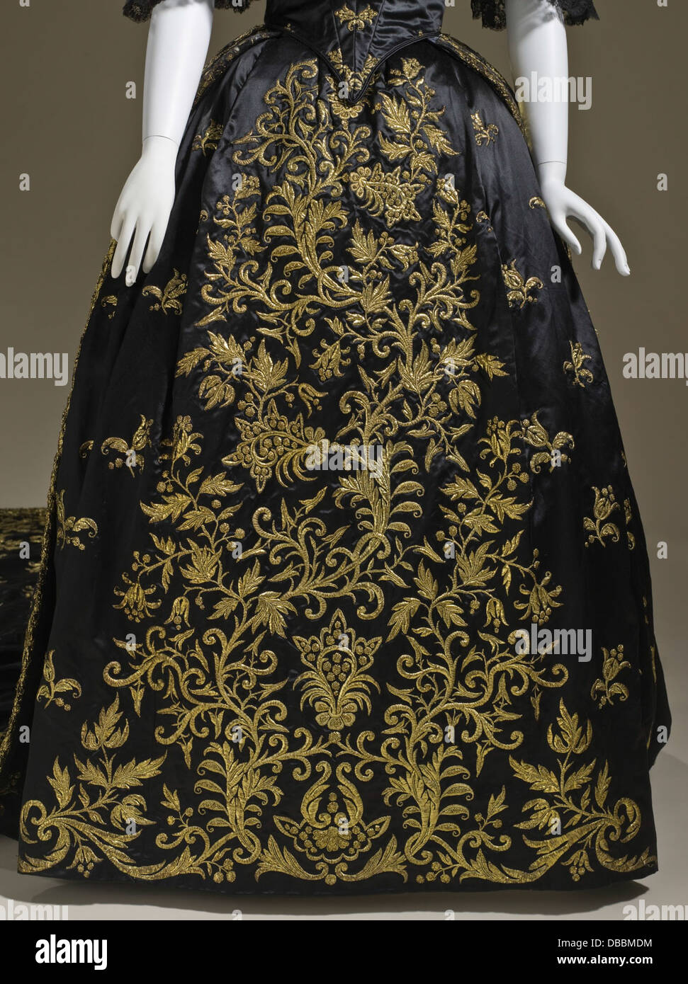 This woman's dress ensemble illustrates the fashion of the time ...