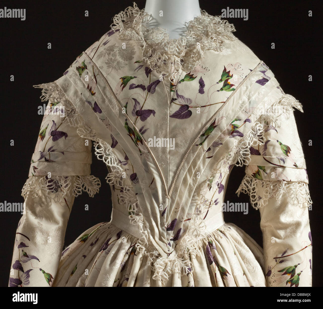 This woman's dress is a representation of historical fashion ...