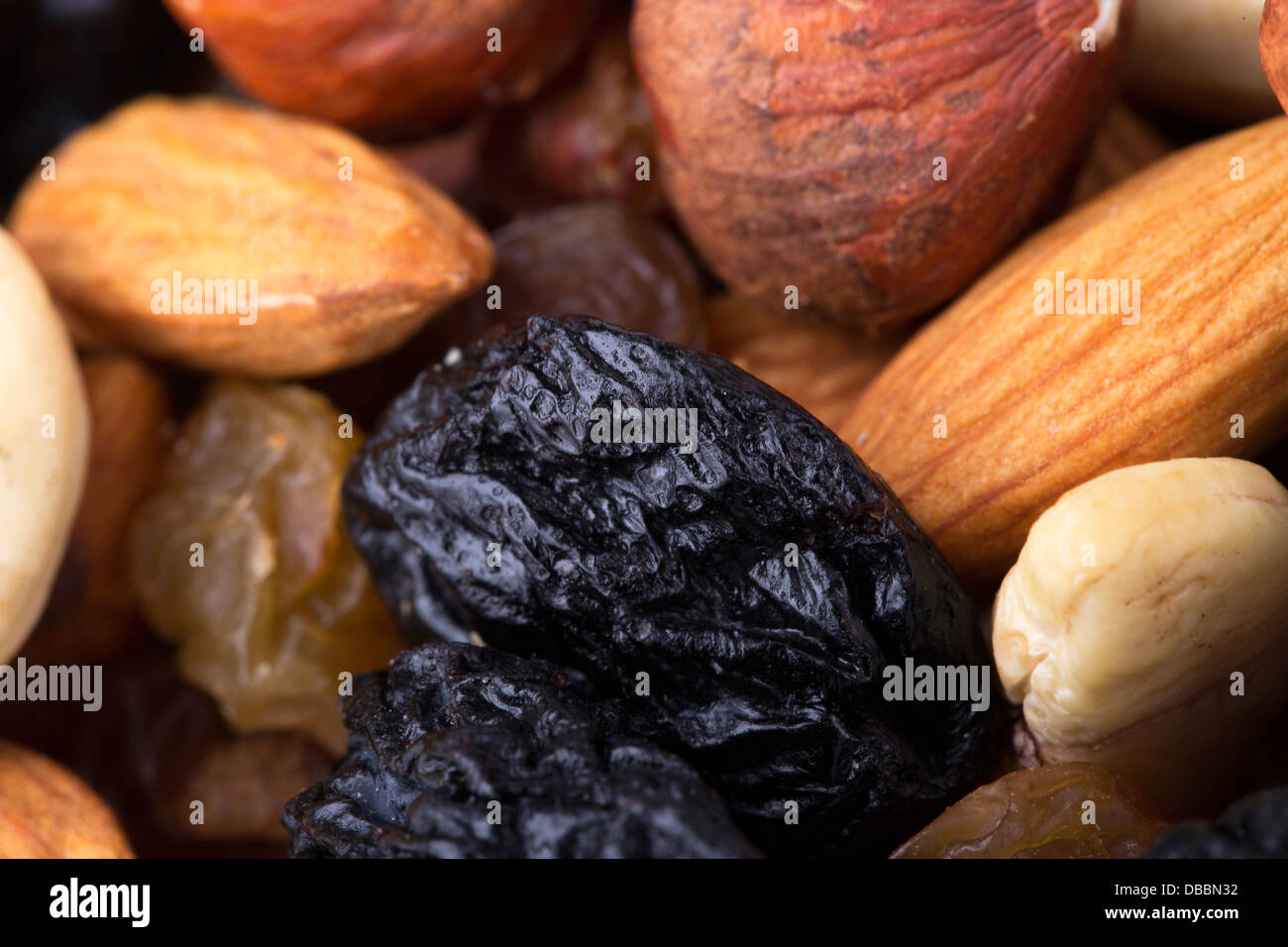 dried fruits and nuts close up background Stock Photo - Alamy
