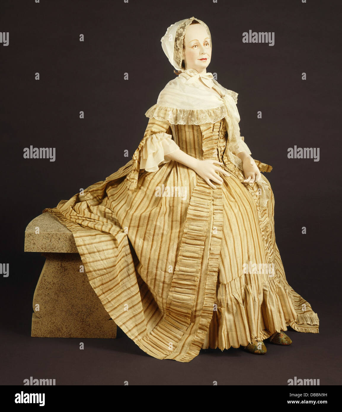 This woman's sack gown, crafted with attention to fabric design and ...