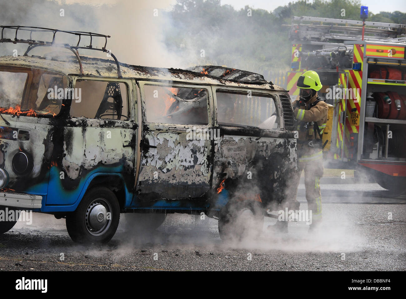 A 1970's Volkswagen Camper Van is destroyed by fire at North Weald ...