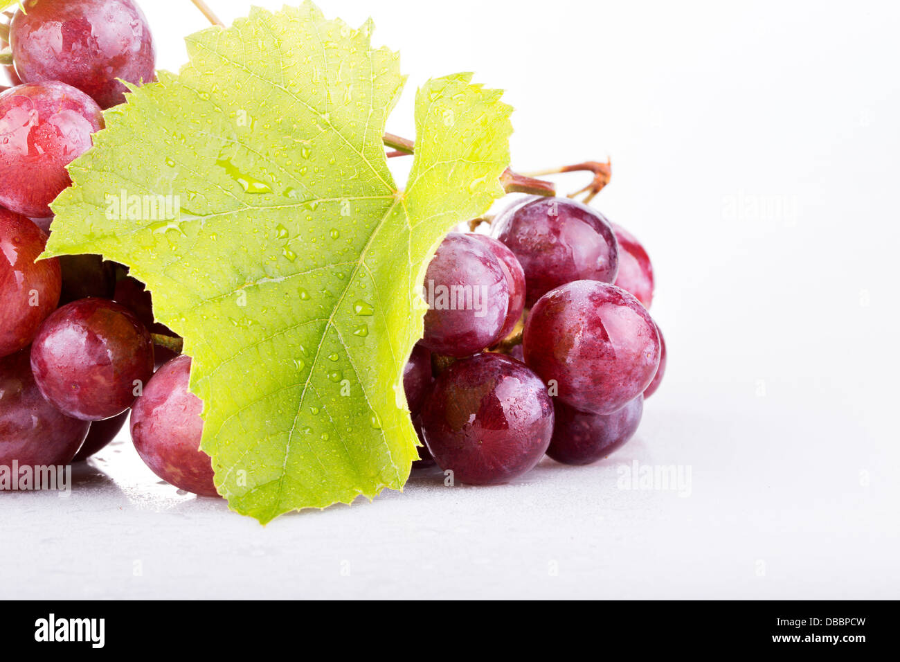 Pink grape isolated on white bacground Stock Photo - Alamy