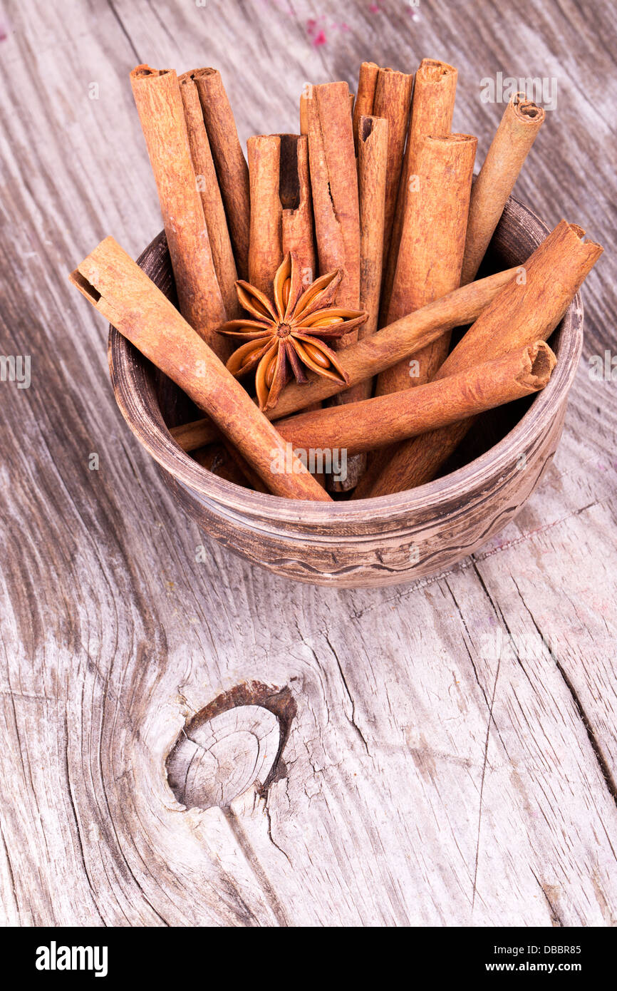 Different spices, Cinnamon, anise on wooden old table Stock Photo - Alamy