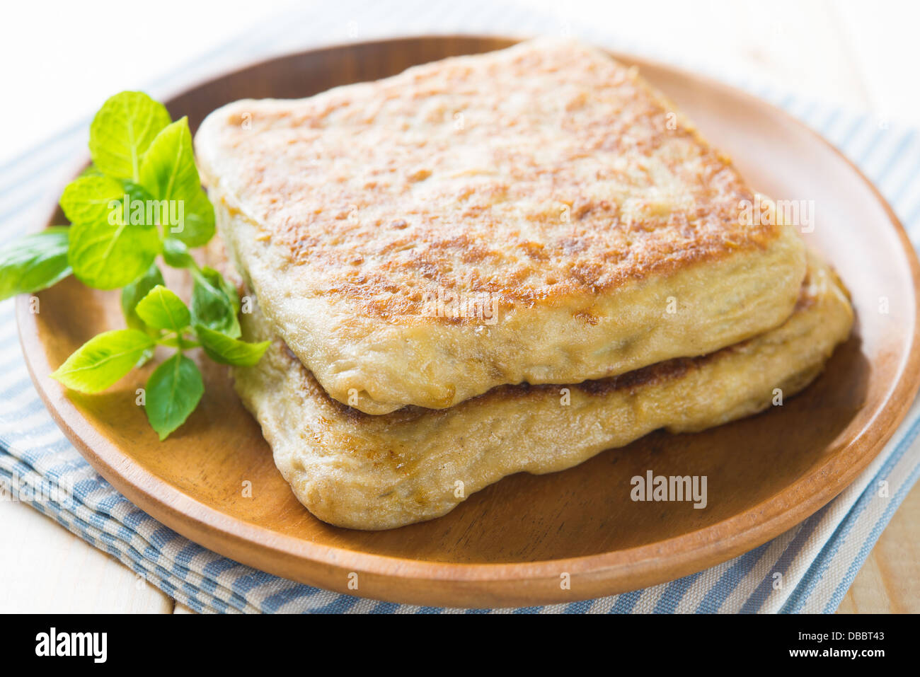 Martabak or murtabak, also mutabbaq, is a stuffed pancake or pan-fried ...